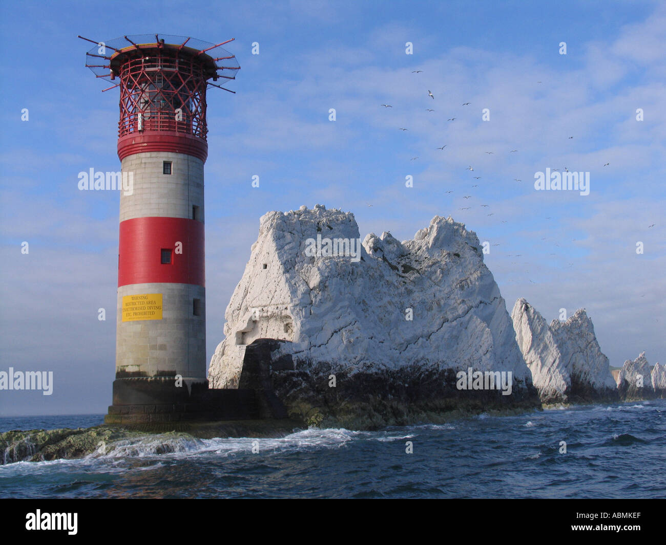 The Needles Lighthouse Isle of Wight on a calm summer evening Stock ...