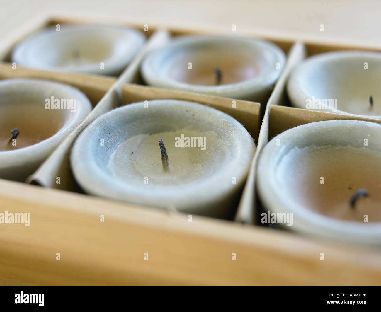 small candle in wooden box Stock Photo - Alamy
