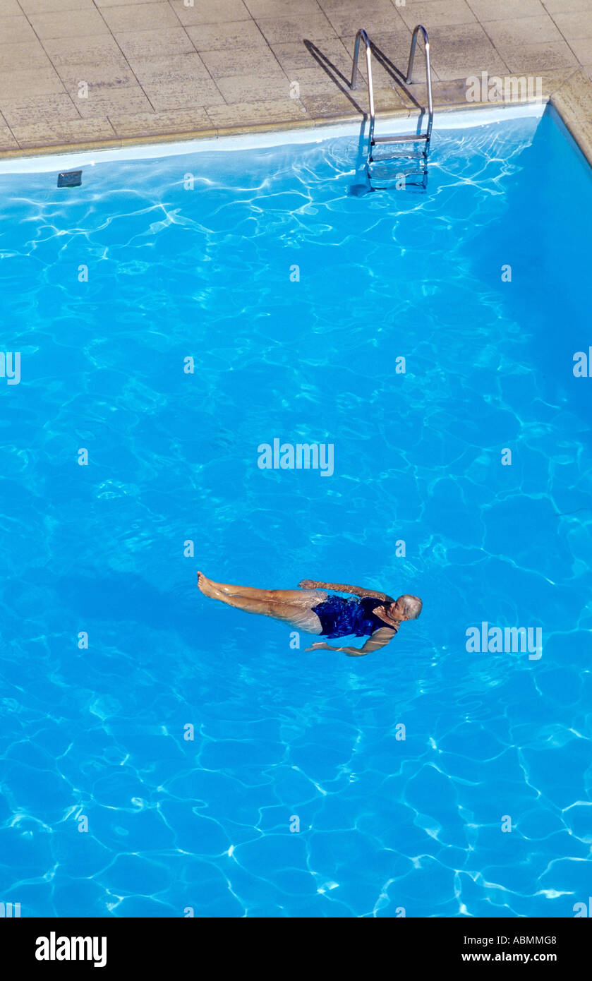 Woman floating in the swimming pool. Funchal, Madeira Stock Photo - Alamy