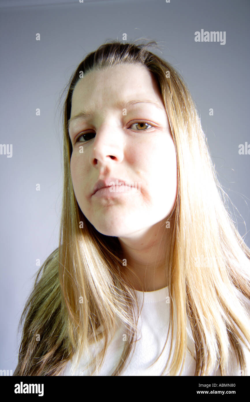 Wide angle distorted shot of a woman in her 20s head and shoulders ...