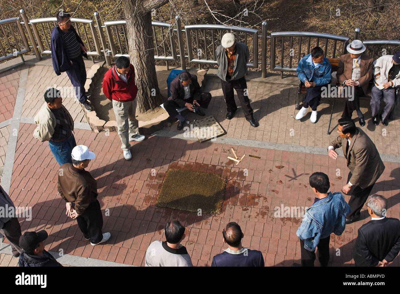 Group playing traditional chinese street game in Incheon South Korea ...