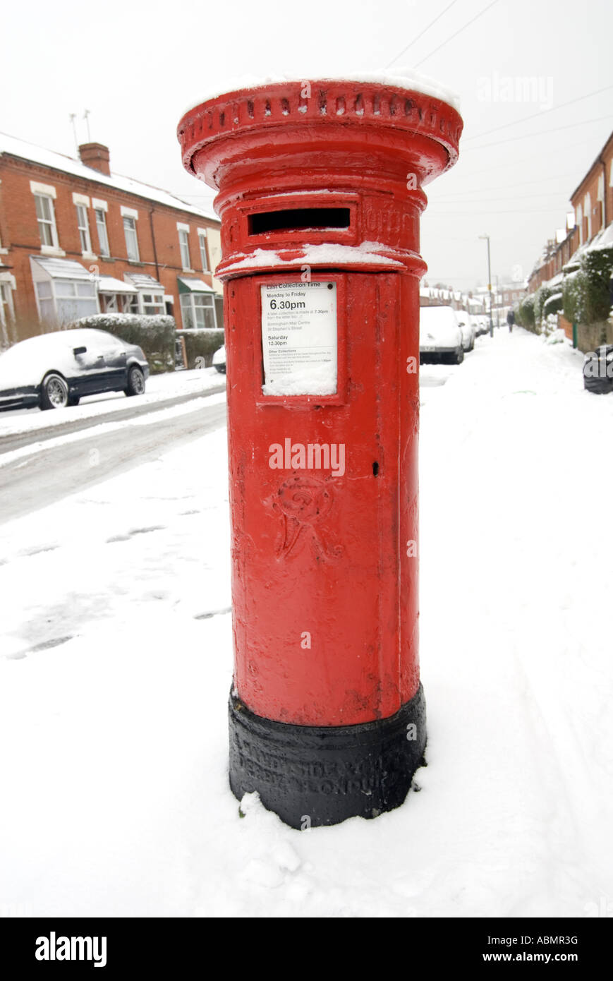 a red British post box surrounded by snow in Birmingham Stock Photo - Alamy