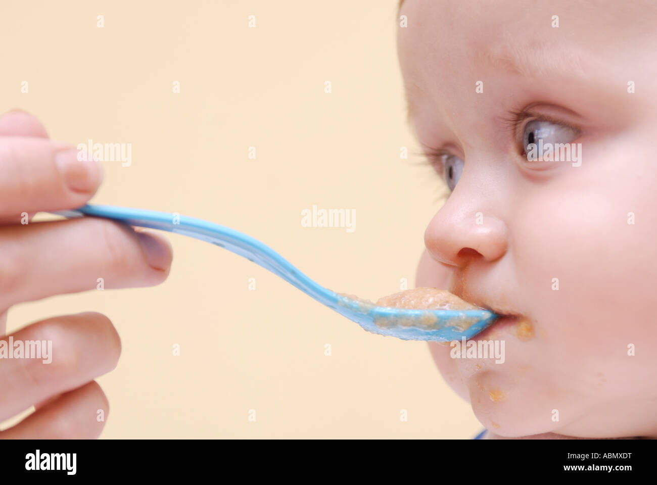 Spoon feeding 10 month hi-res stock photography and images - Alamy