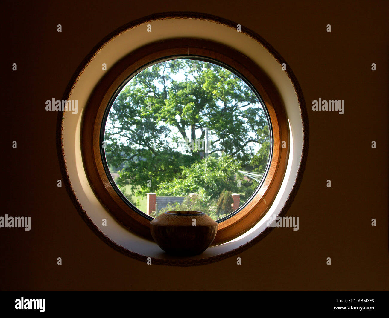 looking through the round window situated in a luxurious dinning room ...