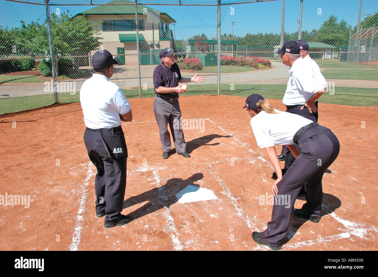 softball umpires for ASA organization in the USA and America during games and in pregame ...