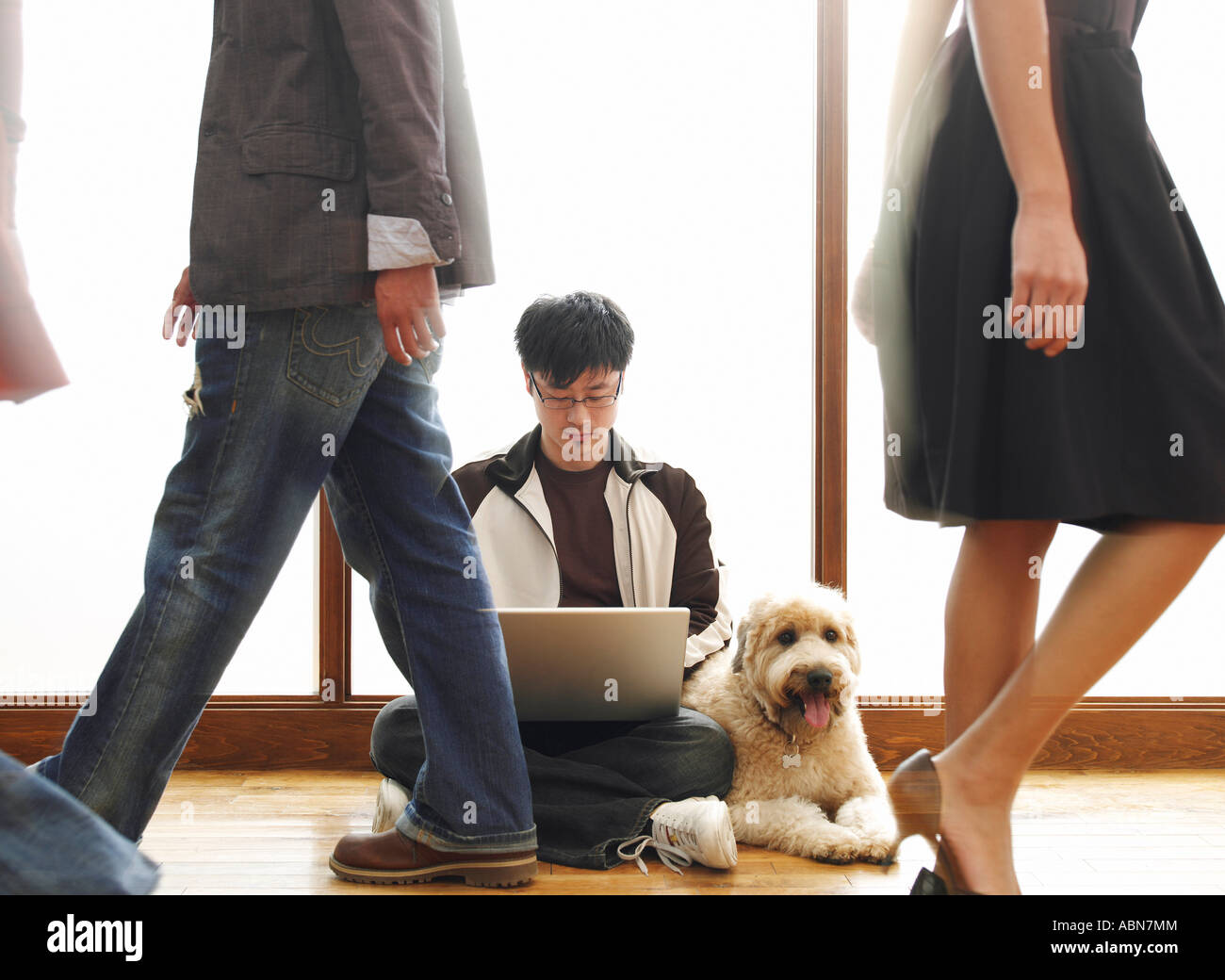 People sitting on side walk hi-res stock photography and images - Alamy