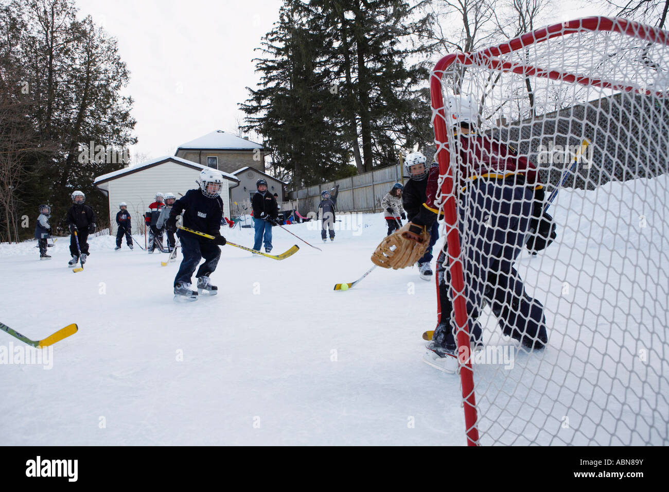 Children Playing Hockey Stock Photo - Alamy