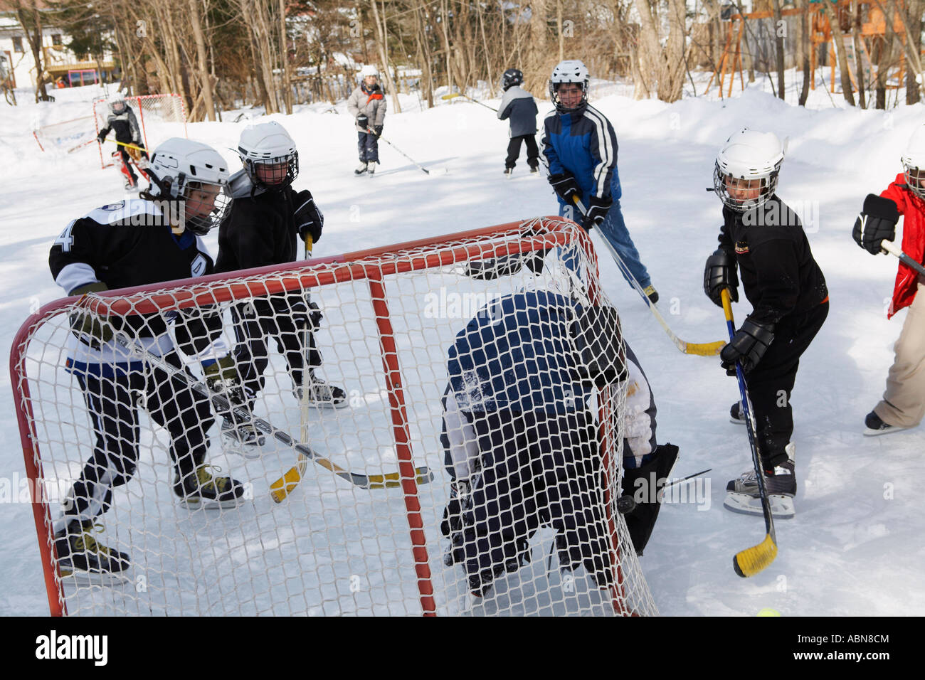 Children Playing Hockey Stock Photo - Alamy