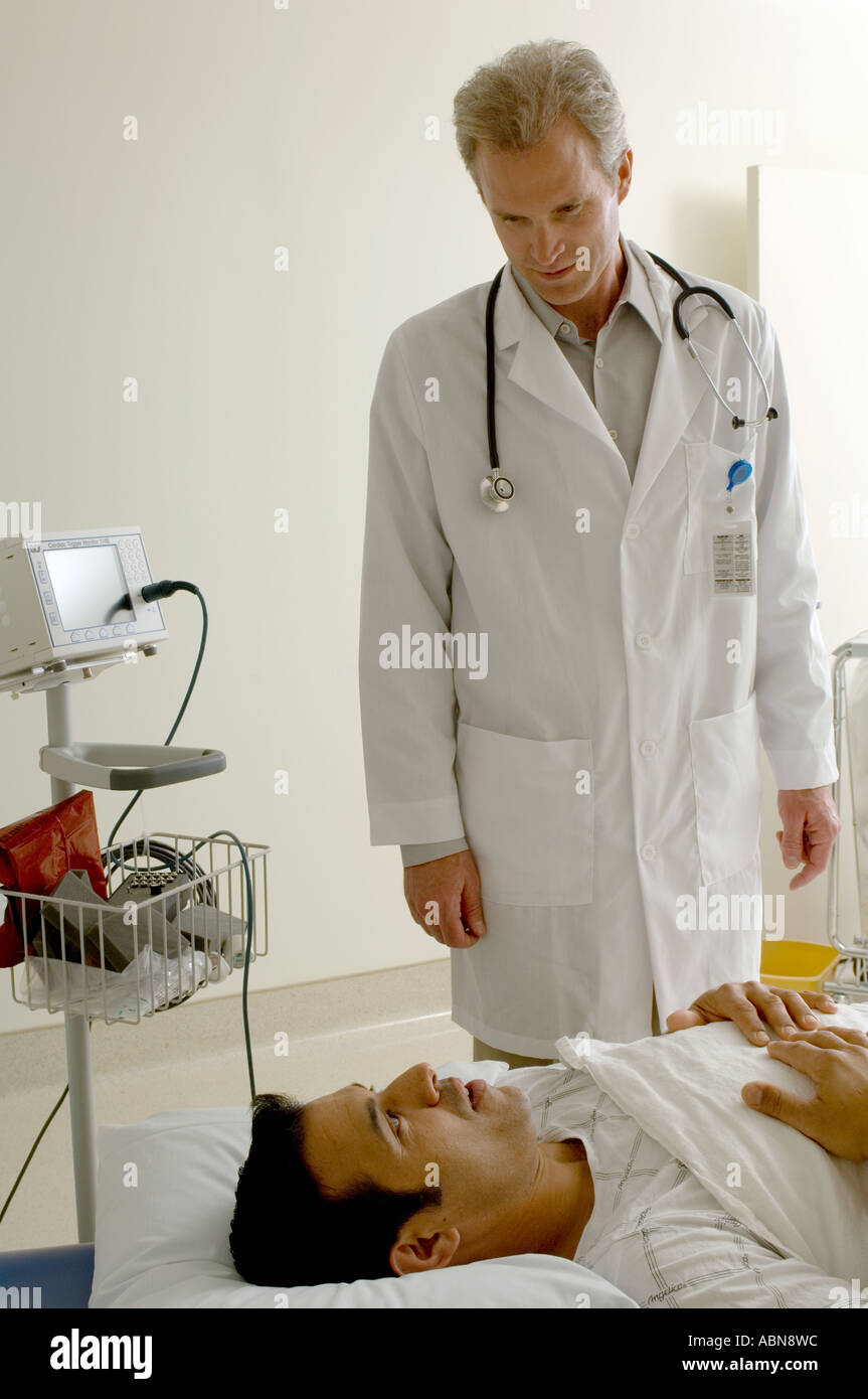 Handsome male doctor explain hi-res stock photography and images - Alamy