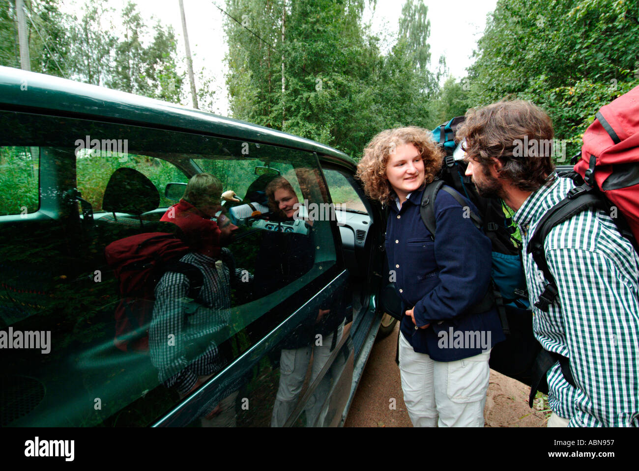 car picking up a young hichthiking couple MR Stock Photo - Alamy