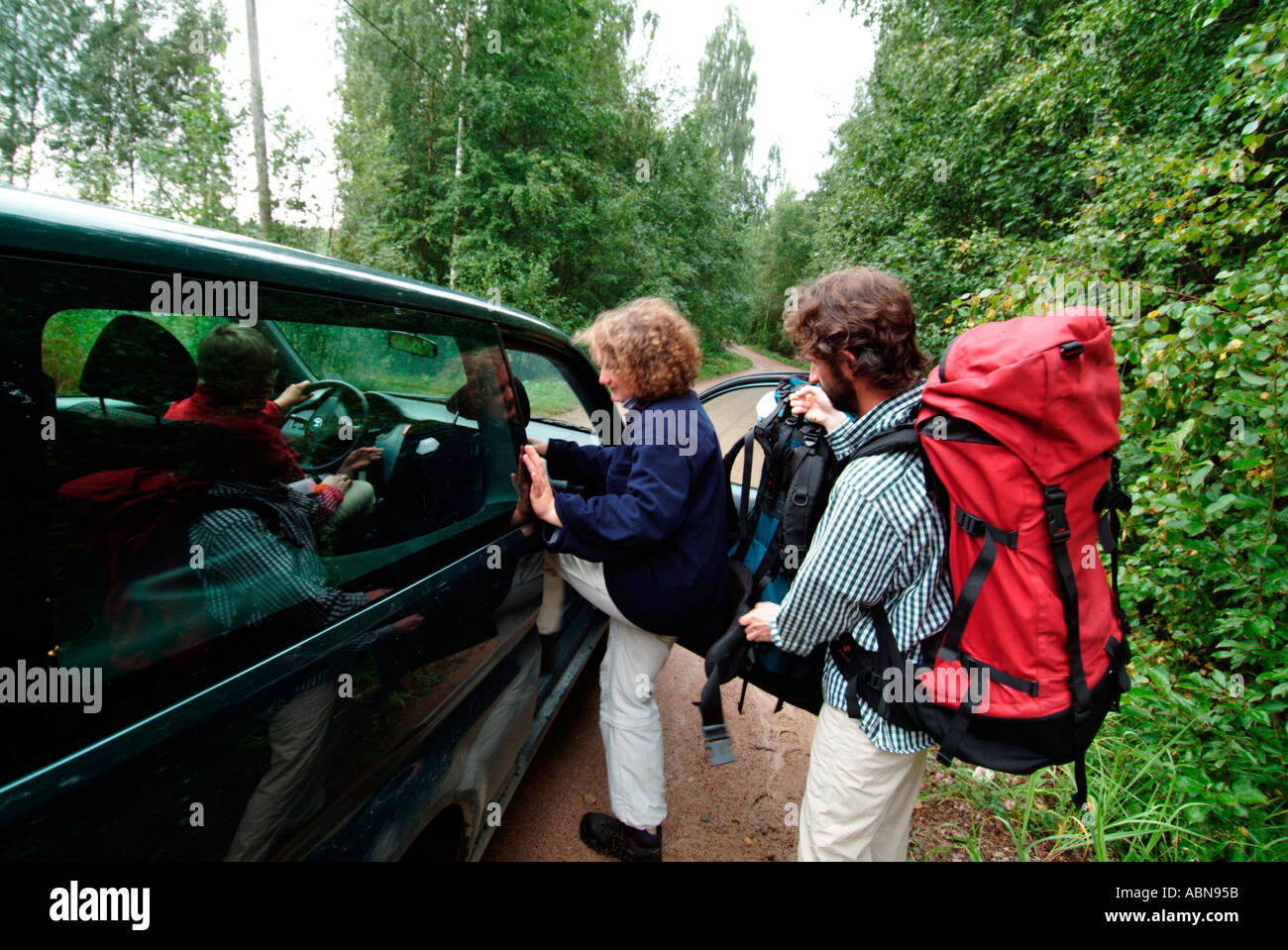 car picking up a young hichthiking couple MR Stock Photo - Alamy