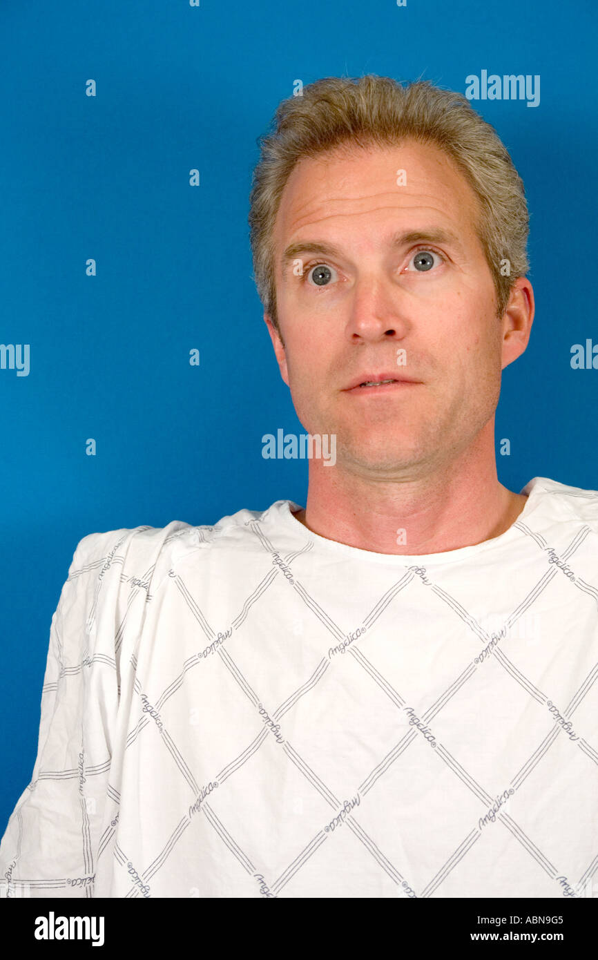 Portrait of male hospital patient looking shocked Stock Photo - Alamy