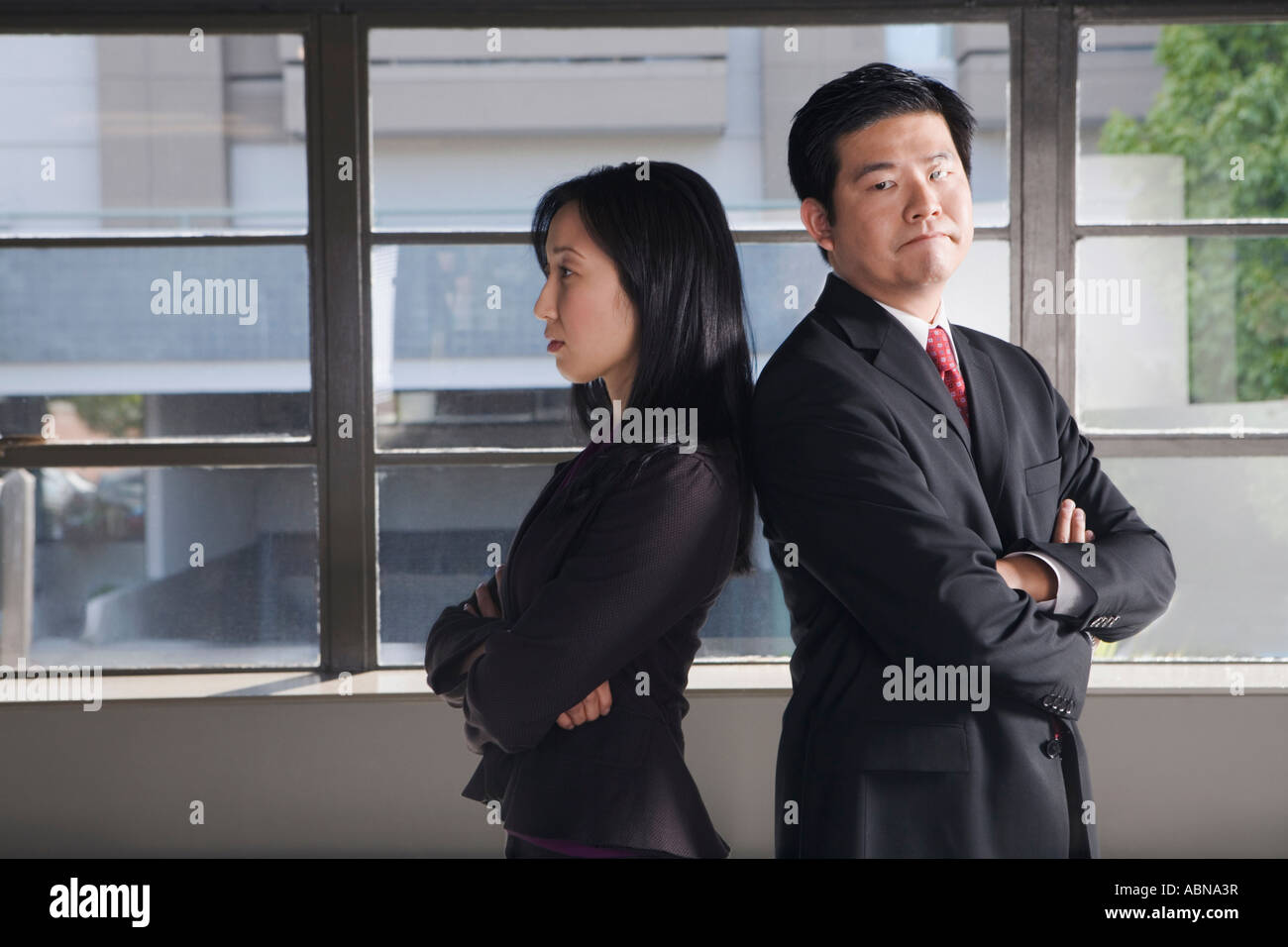 Businesspeople ignoring each other Stock Photo - Alamy