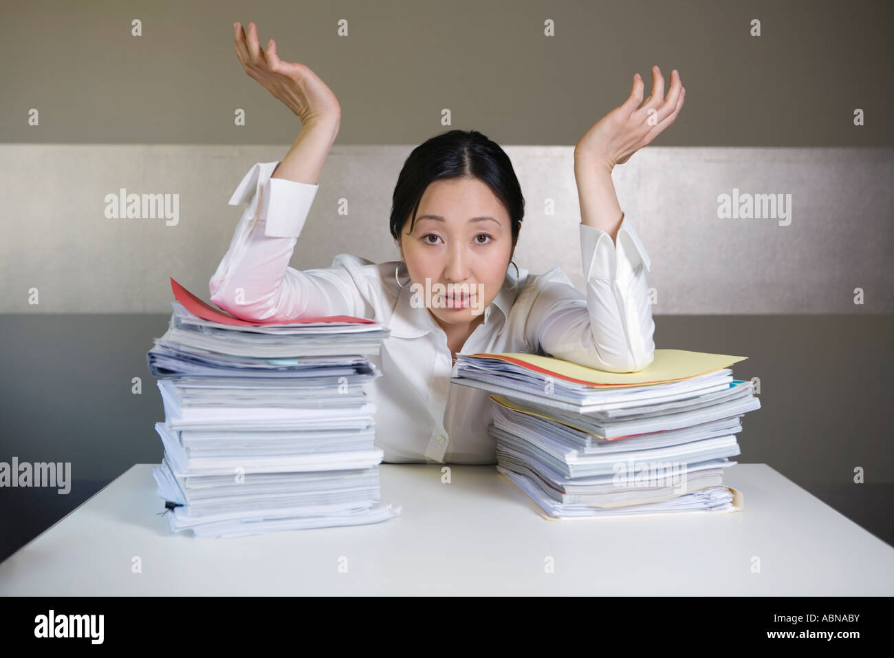 Woman office desk piles of paperwork hi-res stock photography and ...