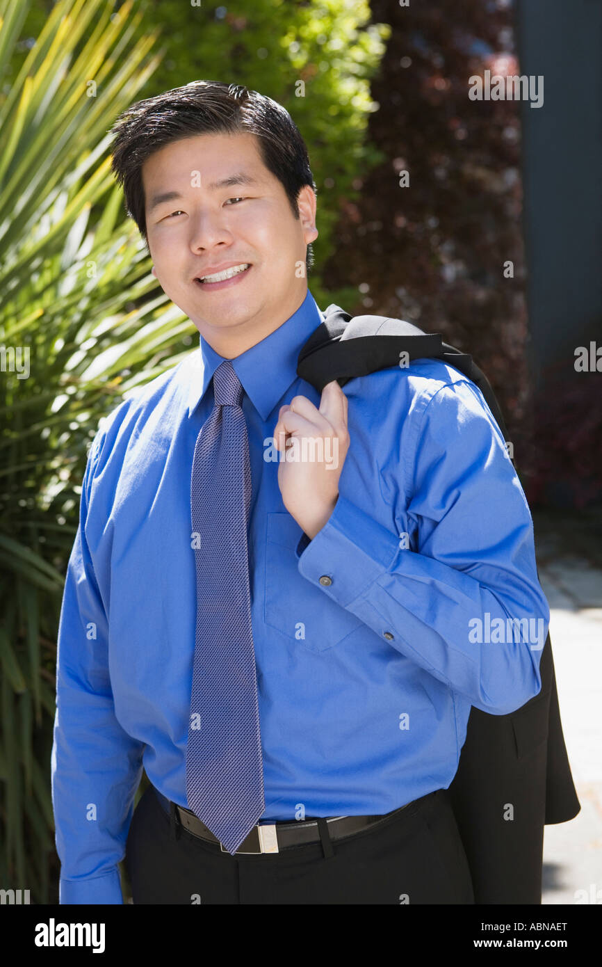 Man carrying jacket over shoulder hi-res stock photography and images ...