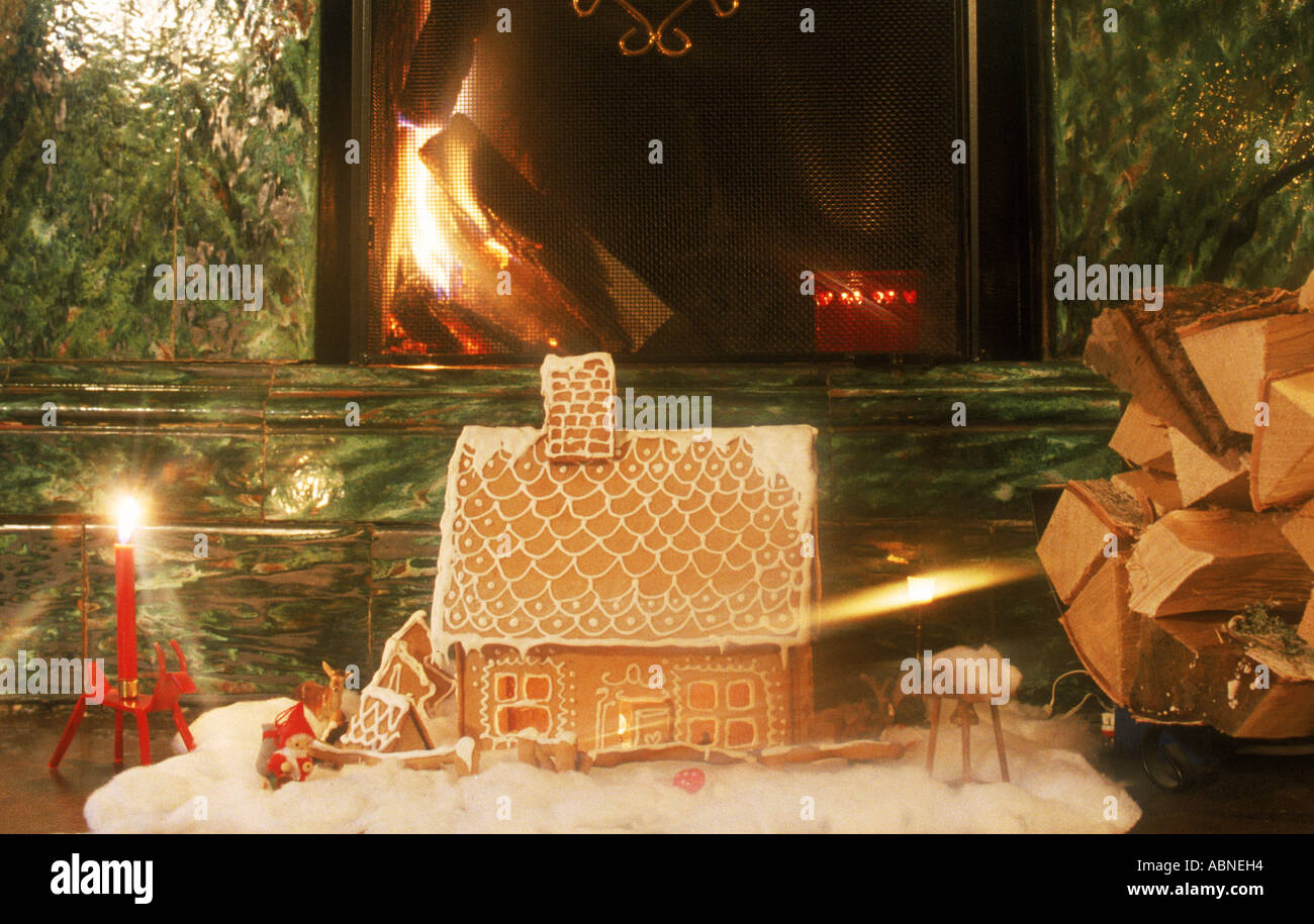 Gingerbread house with fireplace and candles during Christmas Season ...