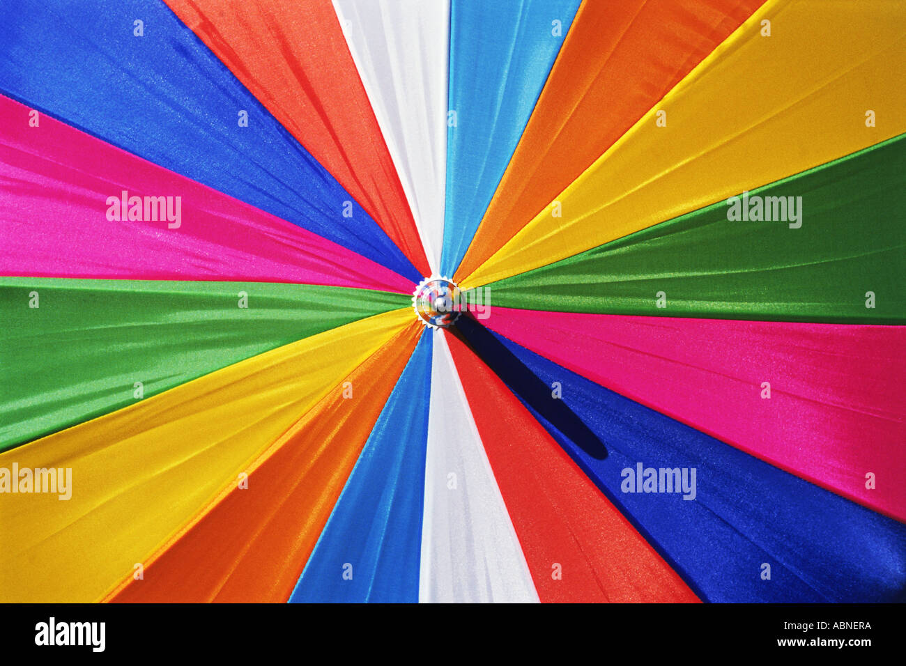 Rainbow colours parasol hi-res stock photography and images - Alamy