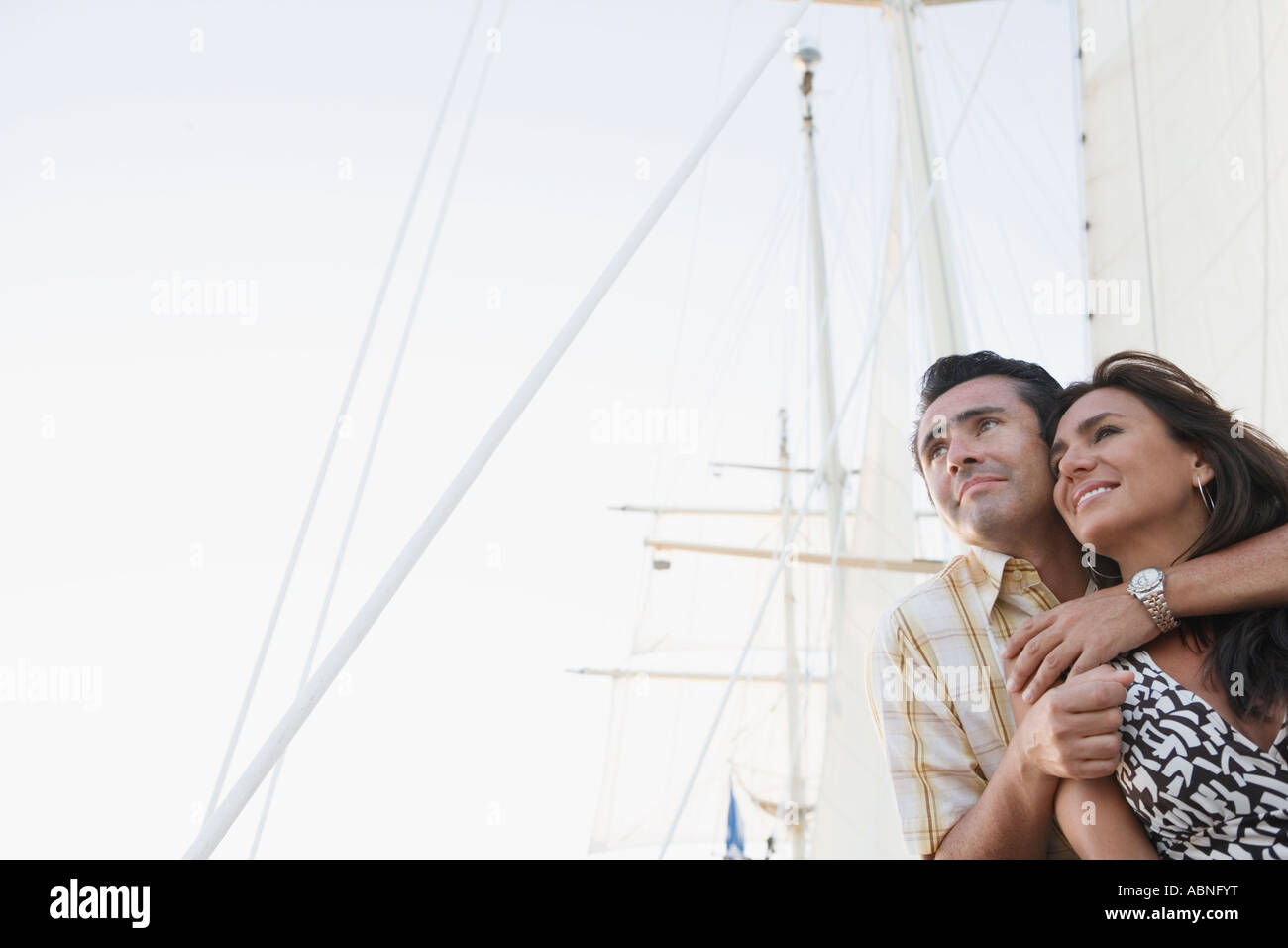 Couple hugging on ship Stock Photo - Alamy