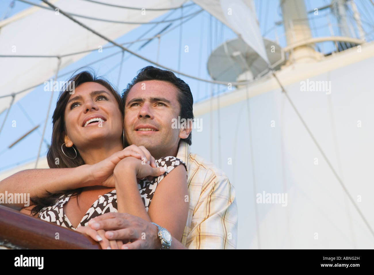 Couple hugging on ship Stock Photo - Alamy
