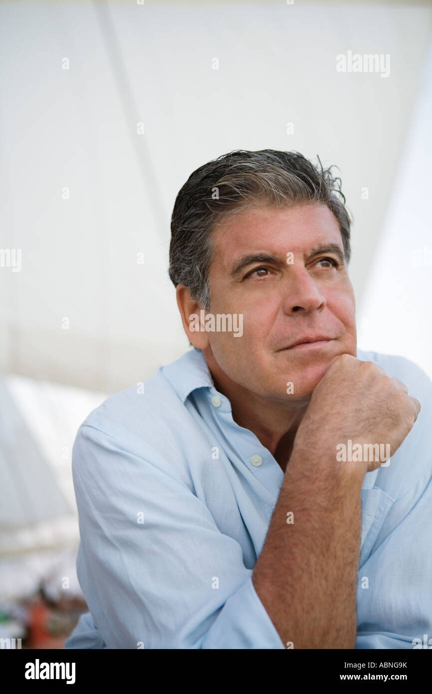 Man thinking on ship Stock Photo - Alamy