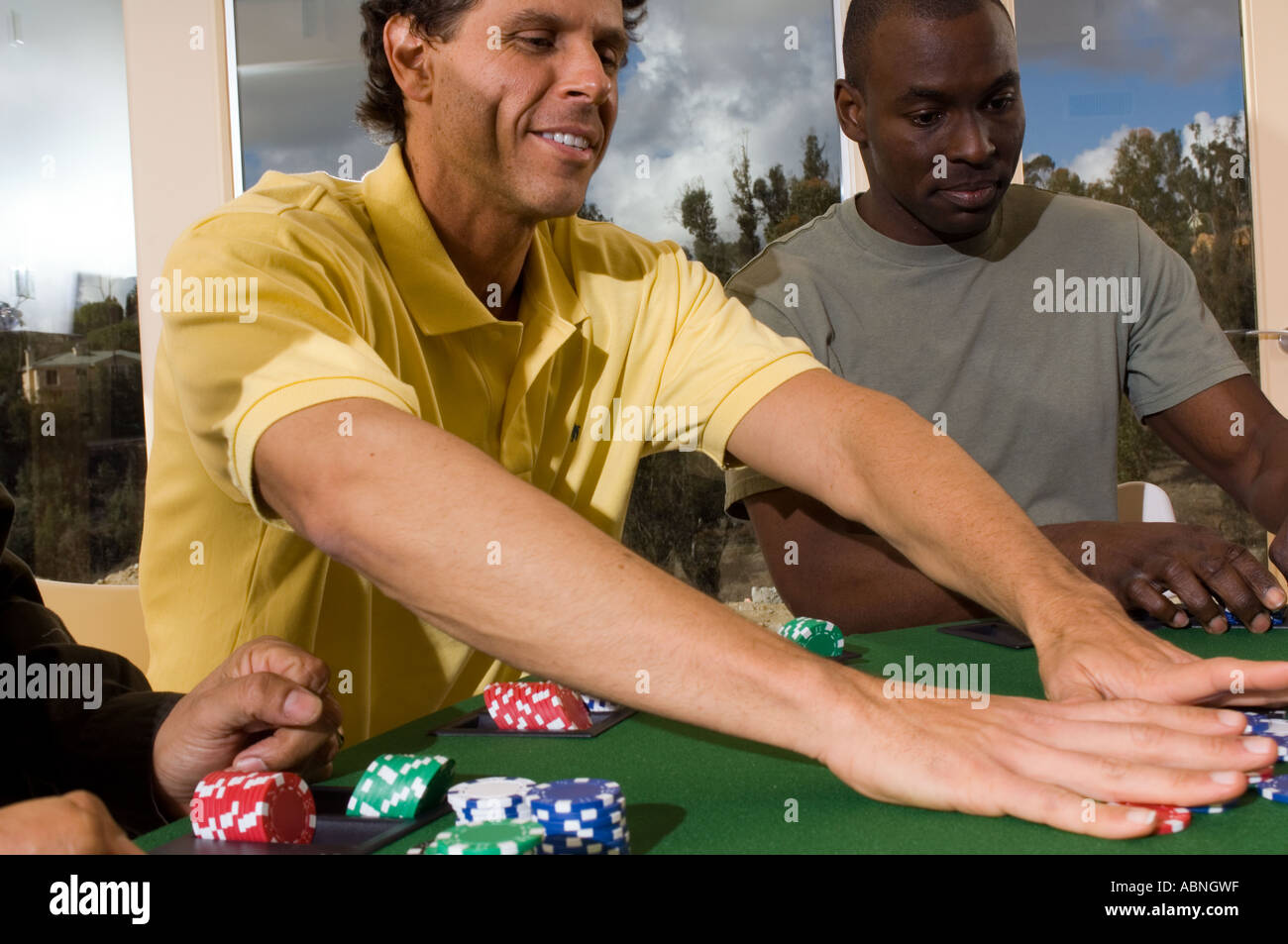 Portrait of men playing cards Stock Photo - Alamy