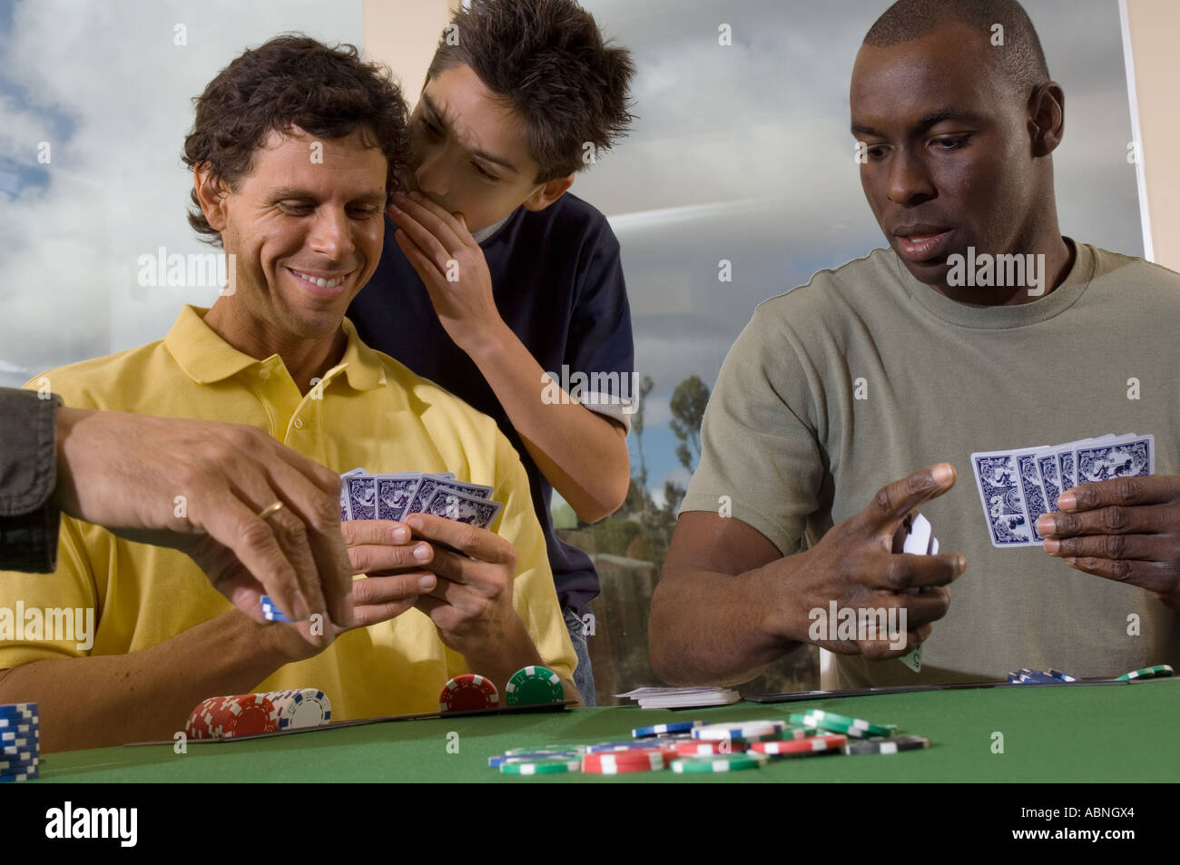 Portrait of men playing cards Stock Photo - Alamy