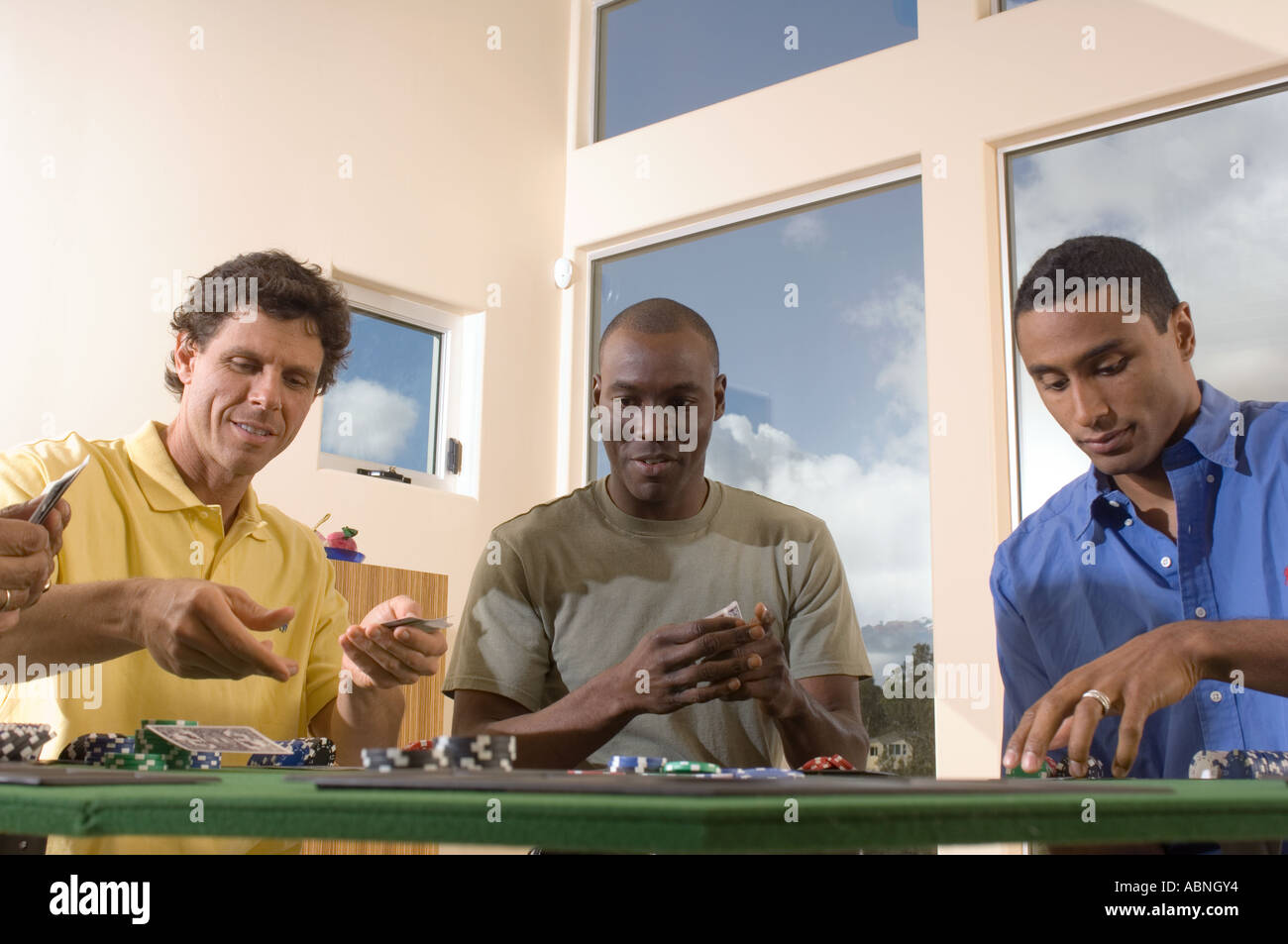 Portrait of men playing cards Stock Photo - Alamy