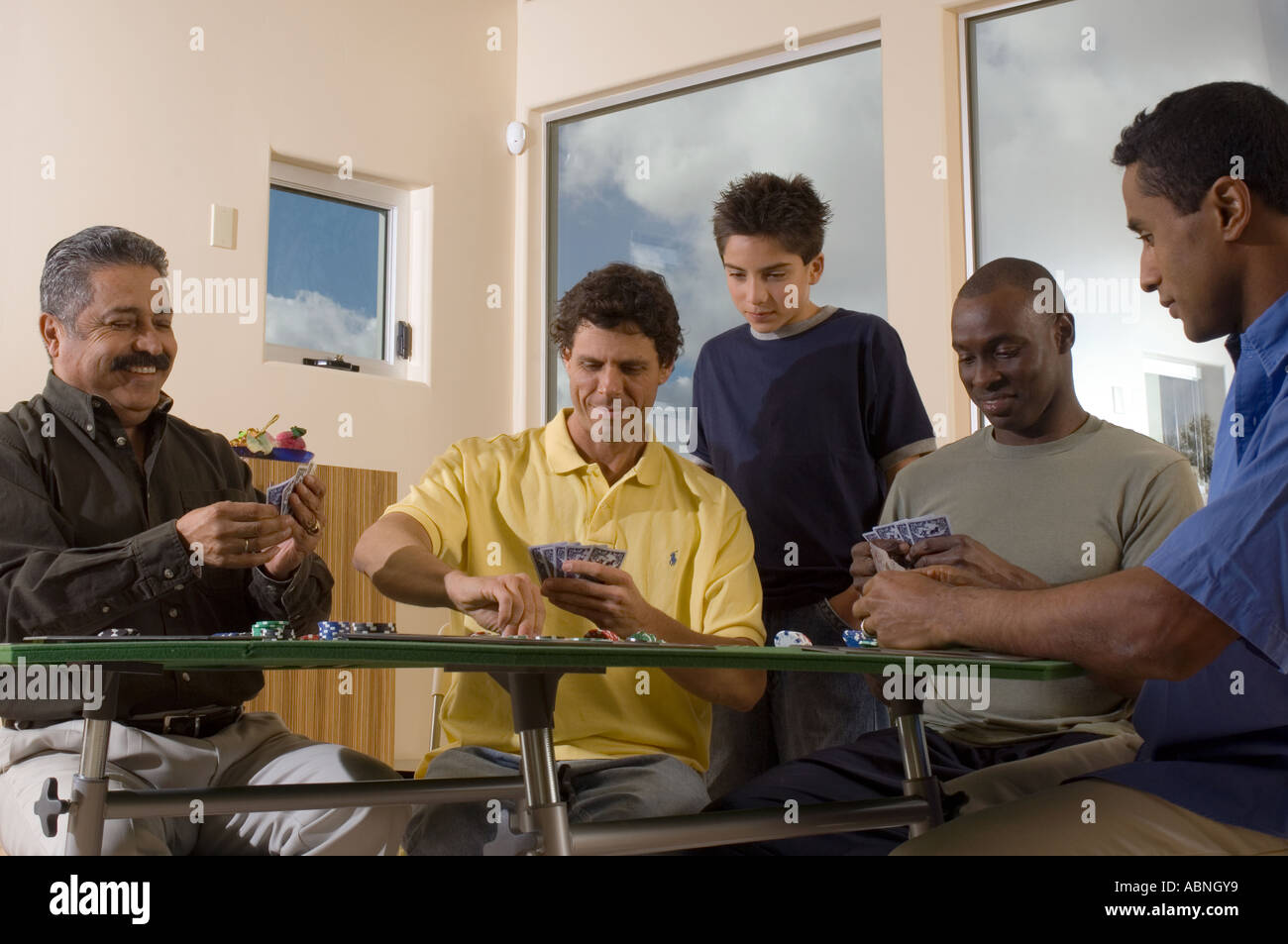 Portrait of men playing cards Stock Photo - Alamy