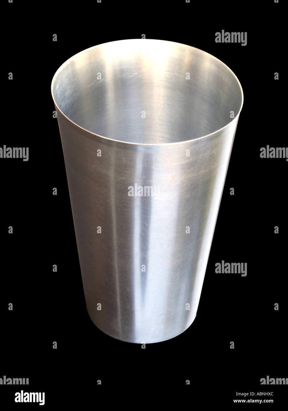 Metal drinking beaker on a black background Stock Photo - Alamy