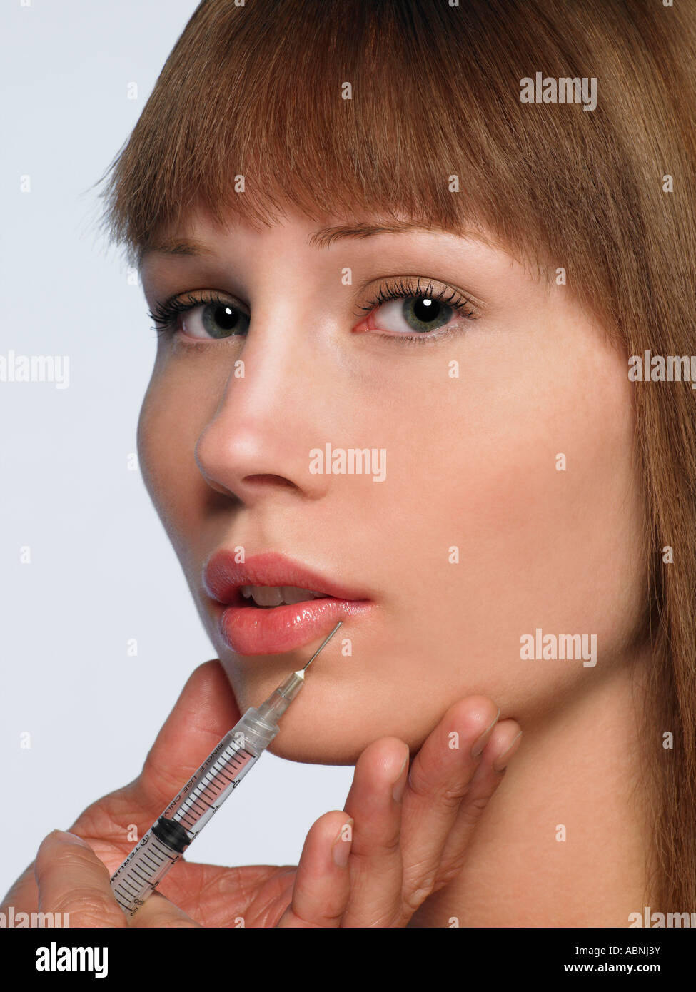 Woman back studio auburn hi-res stock photography and images - Alamy