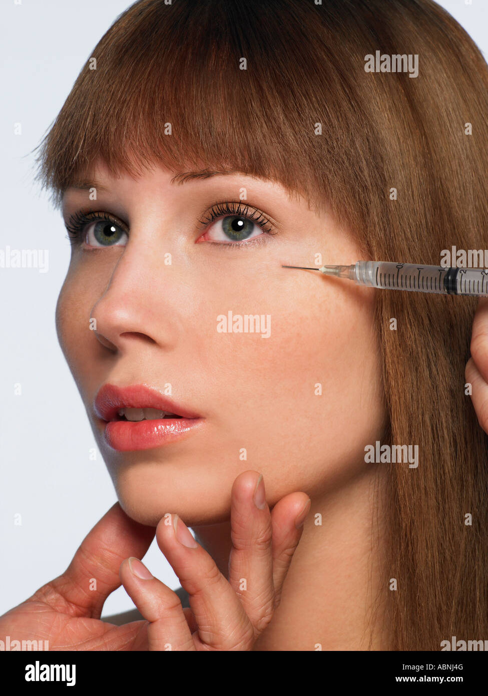 Woman back studio auburn hi-res stock photography and images - Alamy