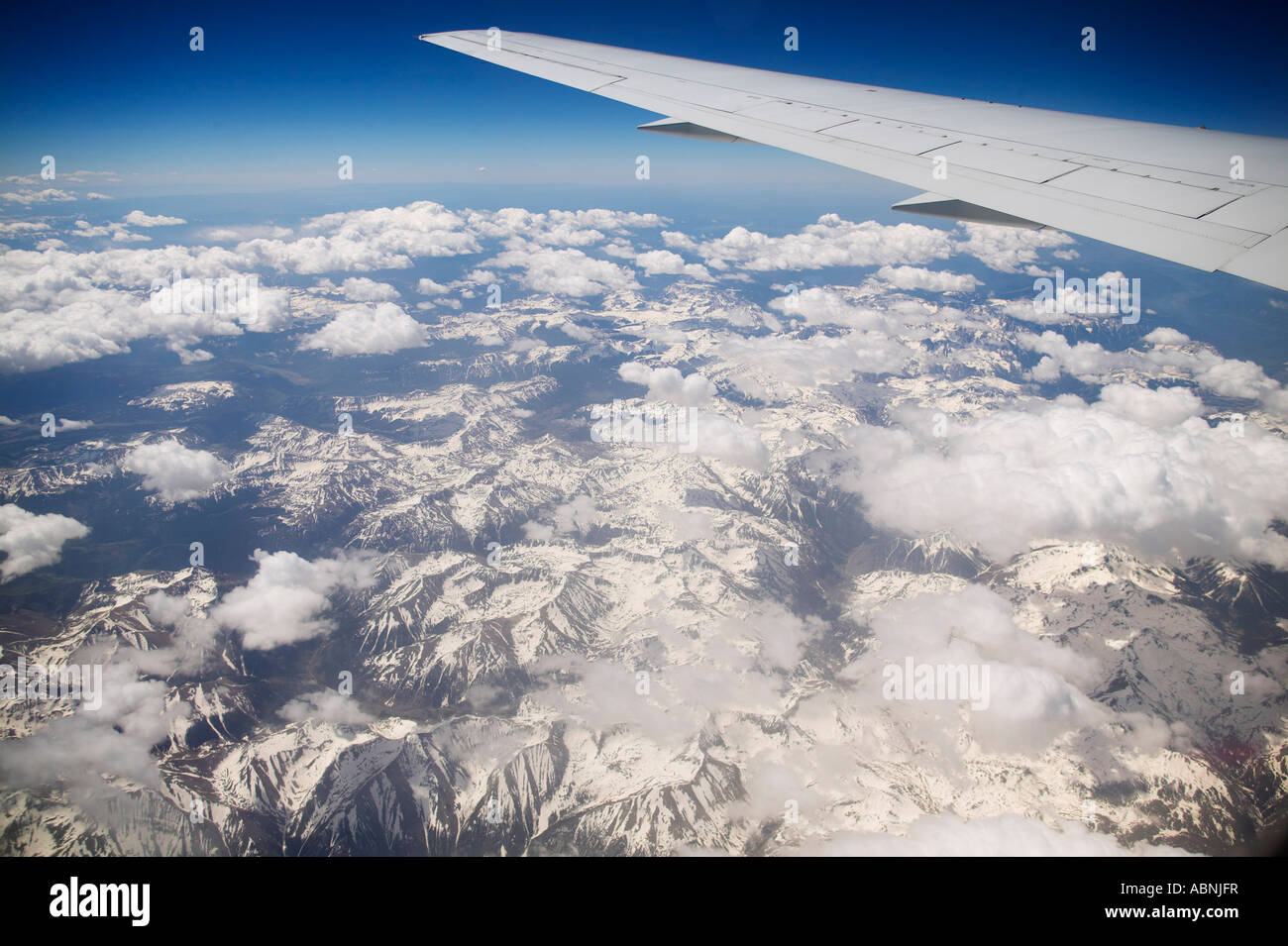 Aeroplane flying over mountain peak hi-res stock photography and images ...