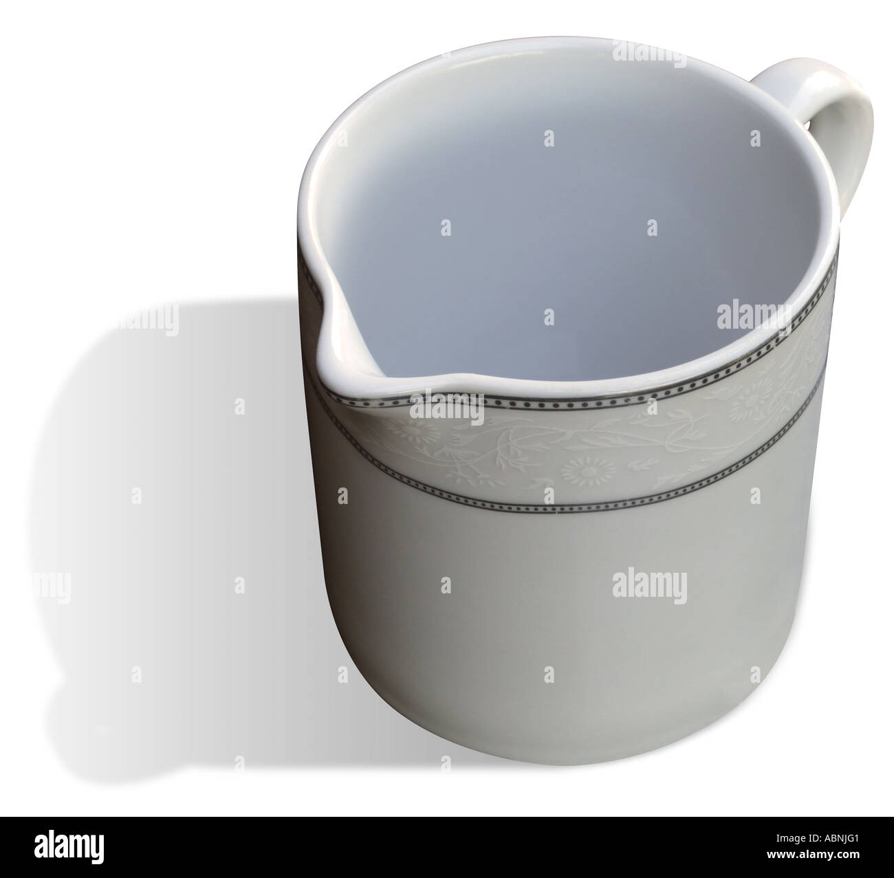 Ceramic creamer on a white background with a shadow Stock Photo - Alamy
