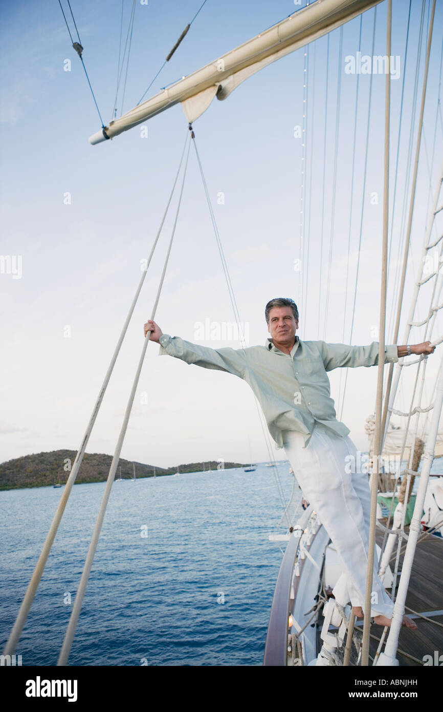 Man clinging to ship’s rigging Stock Photo - Alamy