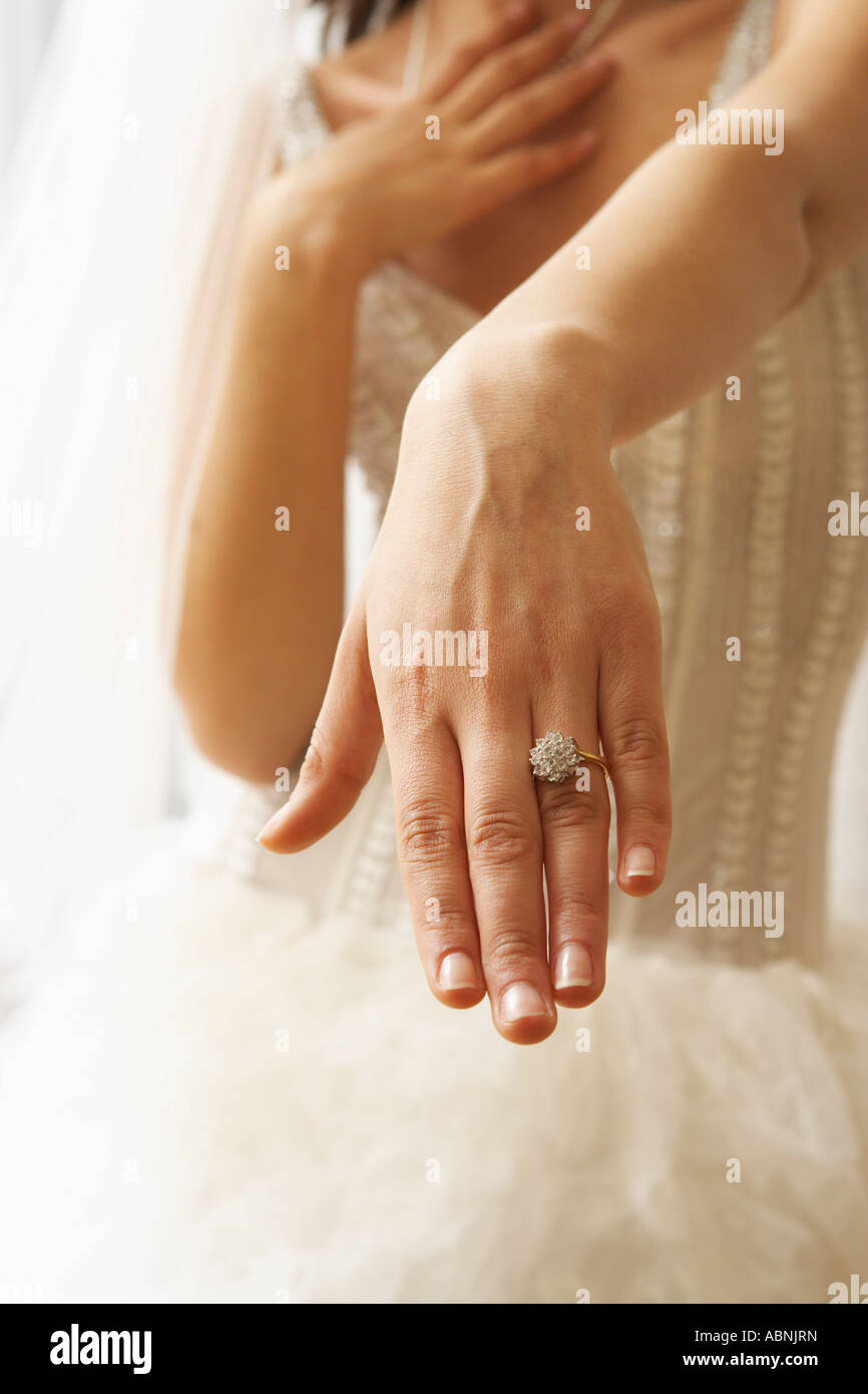 Woman showing off wedding ring hi-res stock photography and images - Alamy