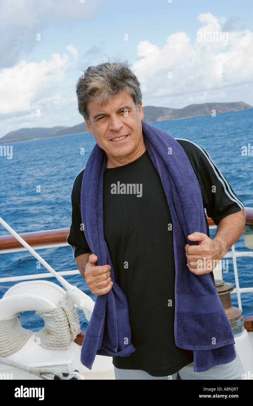 Man standing on ship’s deck Stock Photo - Alamy