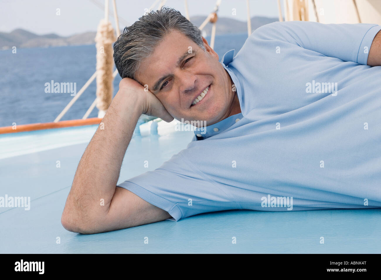 Man laying on deck hi-res stock photography and images - Alamy
