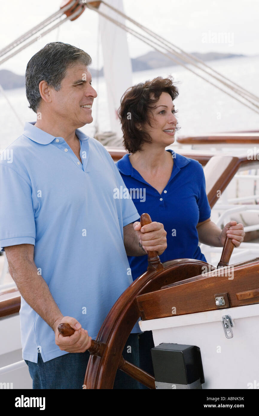 Woman steering ship hi-res stock photography and images - Alamy