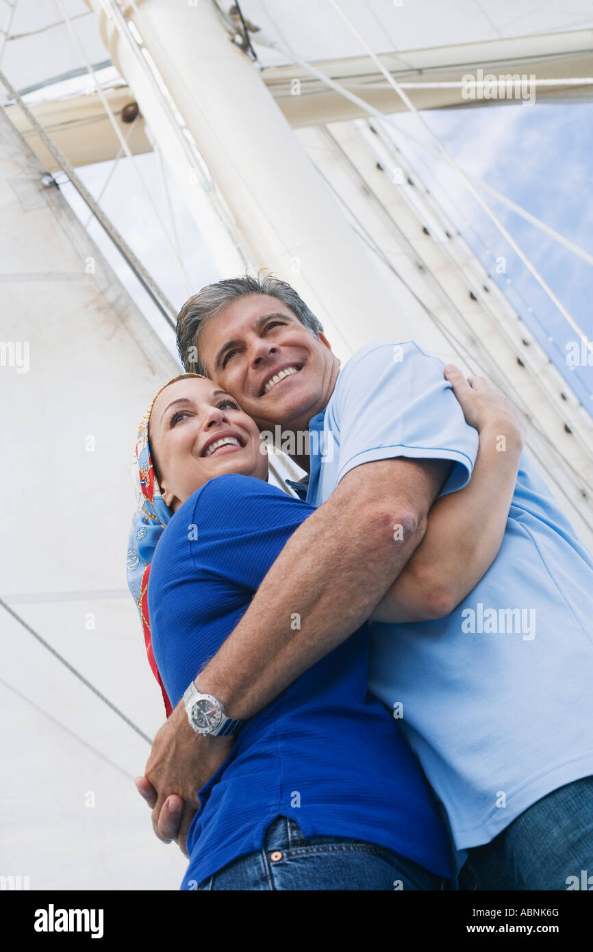 Couple hugging on ship deck Stock Photo - Alamy