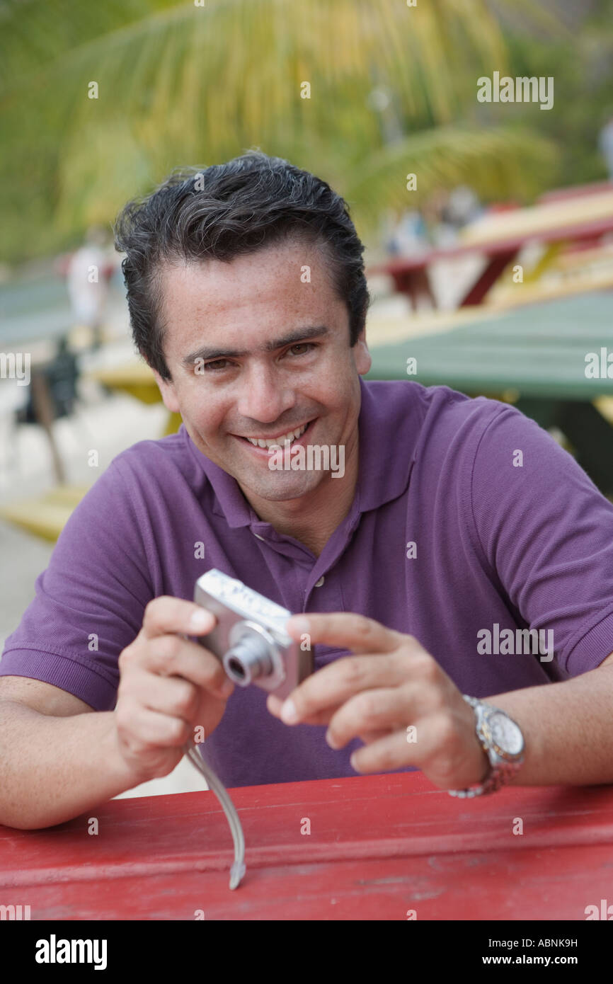 Man using digital camera Stock Photo - Alamy