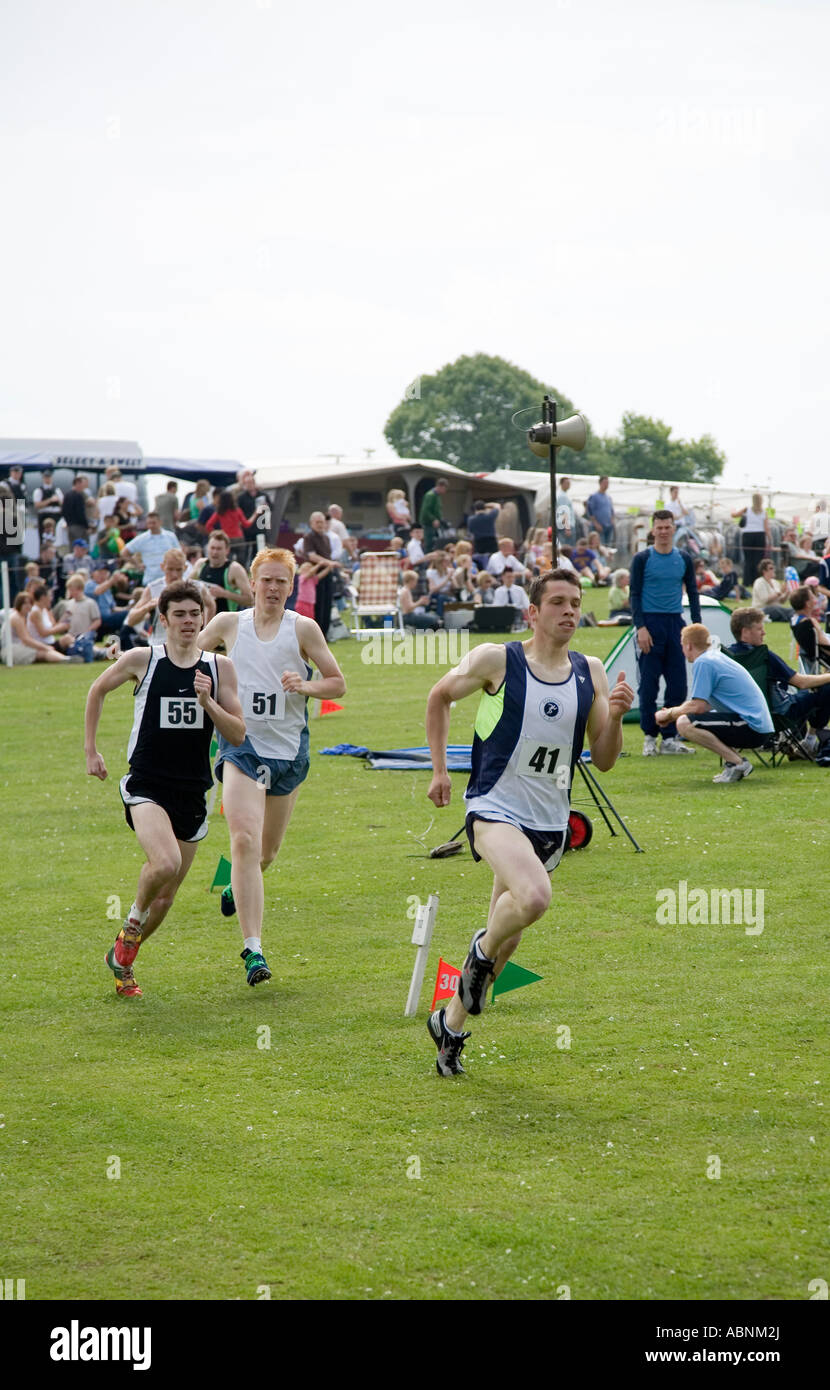 Athletics race on grass track at Markinch Highland games Stock Photo ...