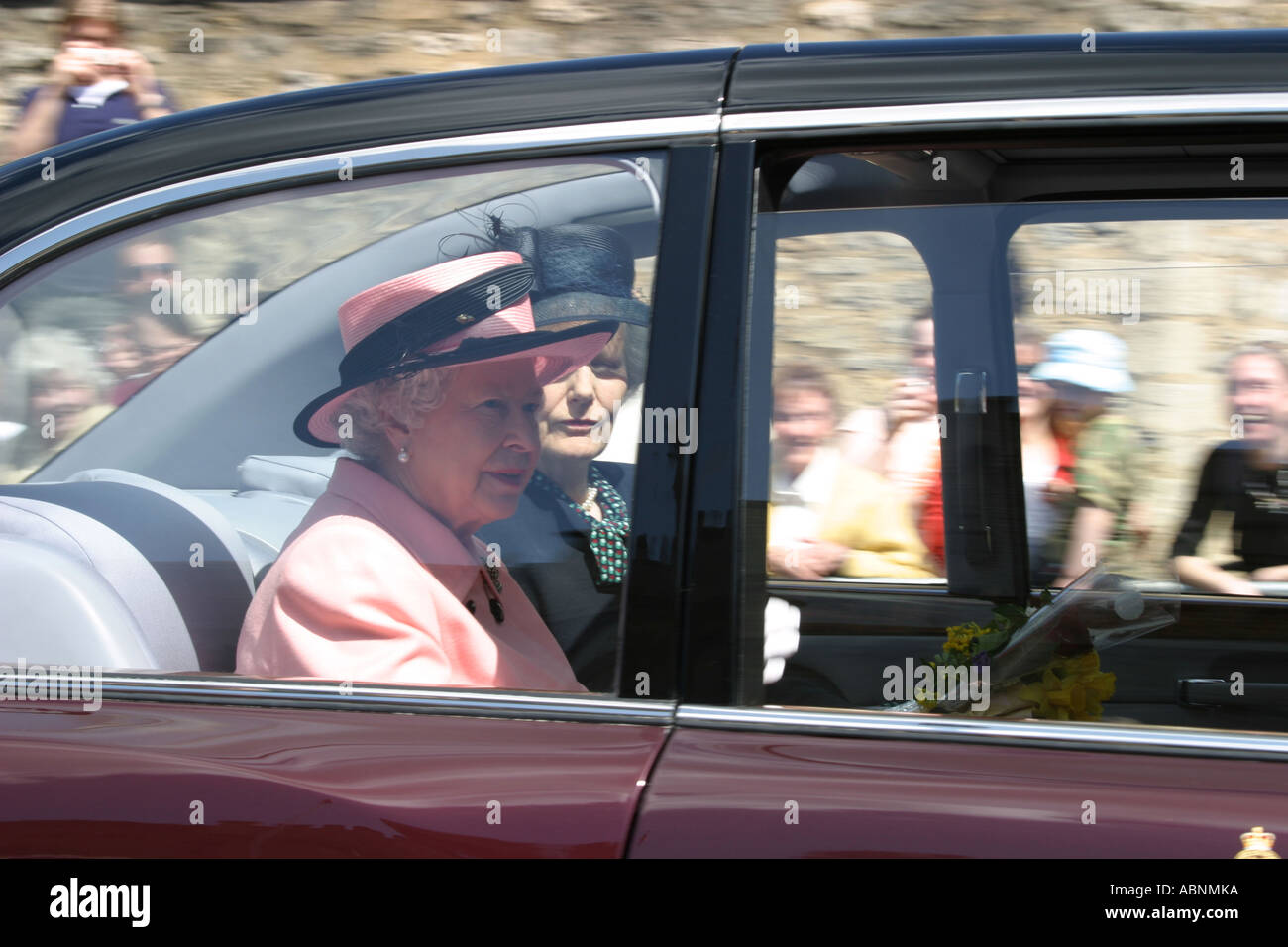 Her Royal Highness Queen Elizabeth the second, being driven through ...