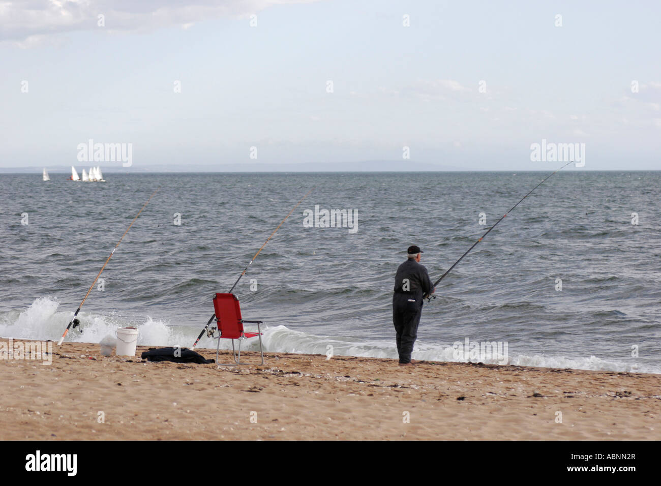 fishing at the beach Stock Photo - Alamy