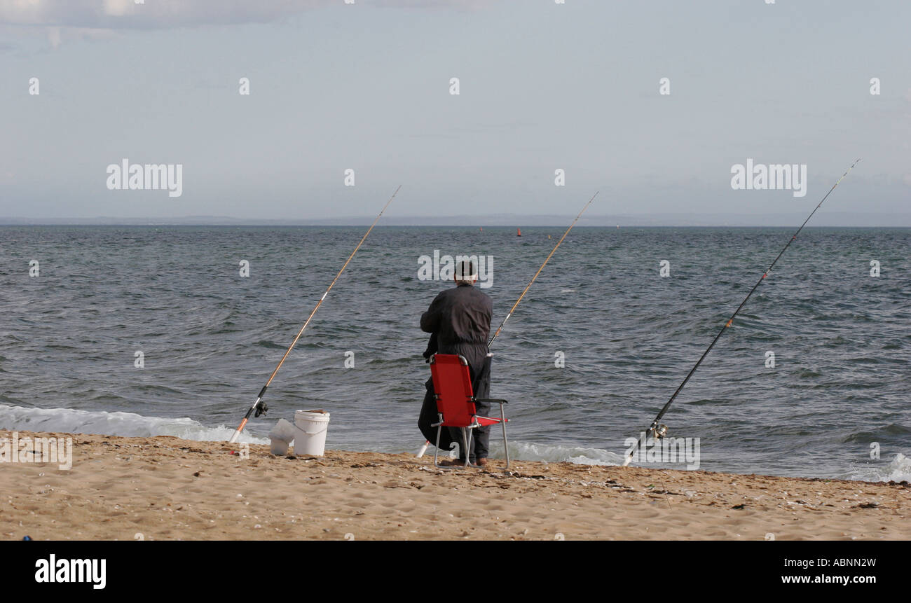 fishing at the beach Stock Photo - Alamy