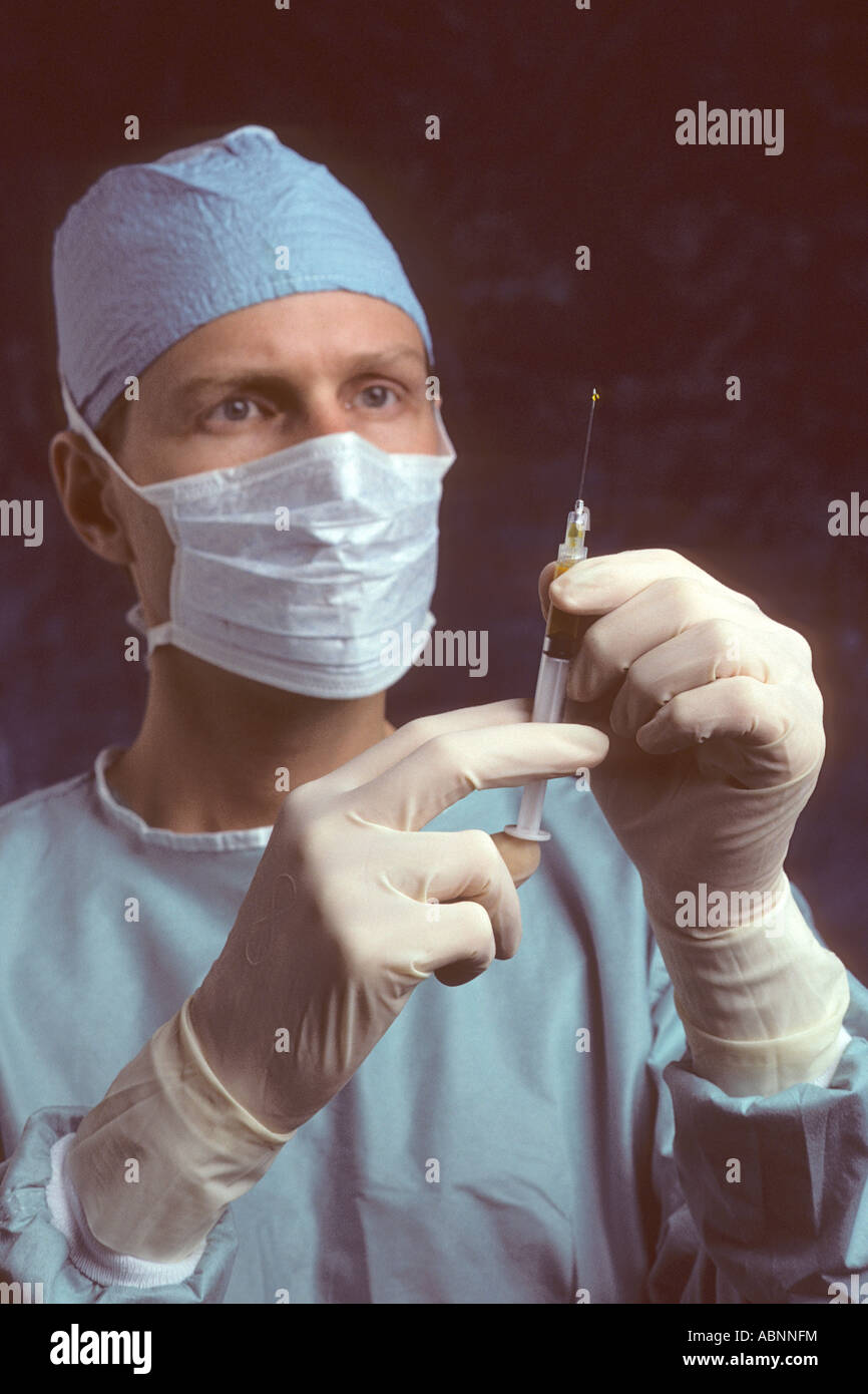 medical, surgical doctor with hypodermic needle Stock Photo - Alamy