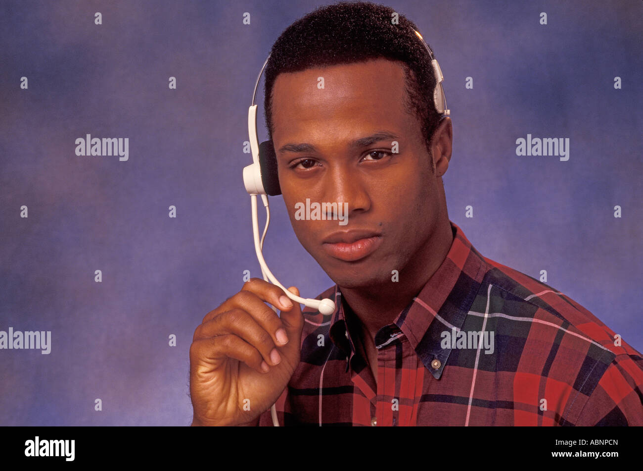 man, 20-30 years old, telephone operator Stock Photo - Alamy