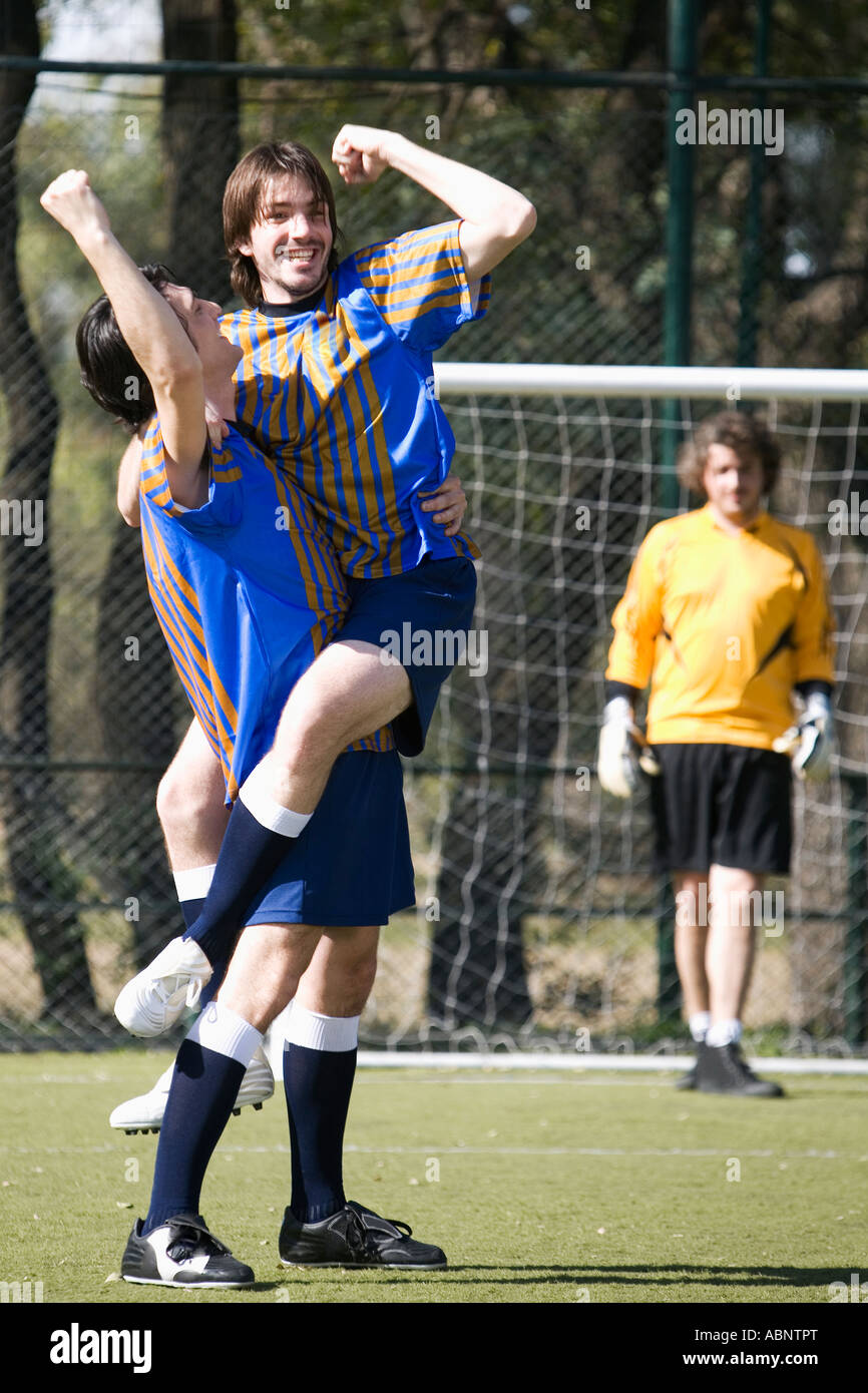 American soccer players hugging hi-res stock photography and images - Alamy