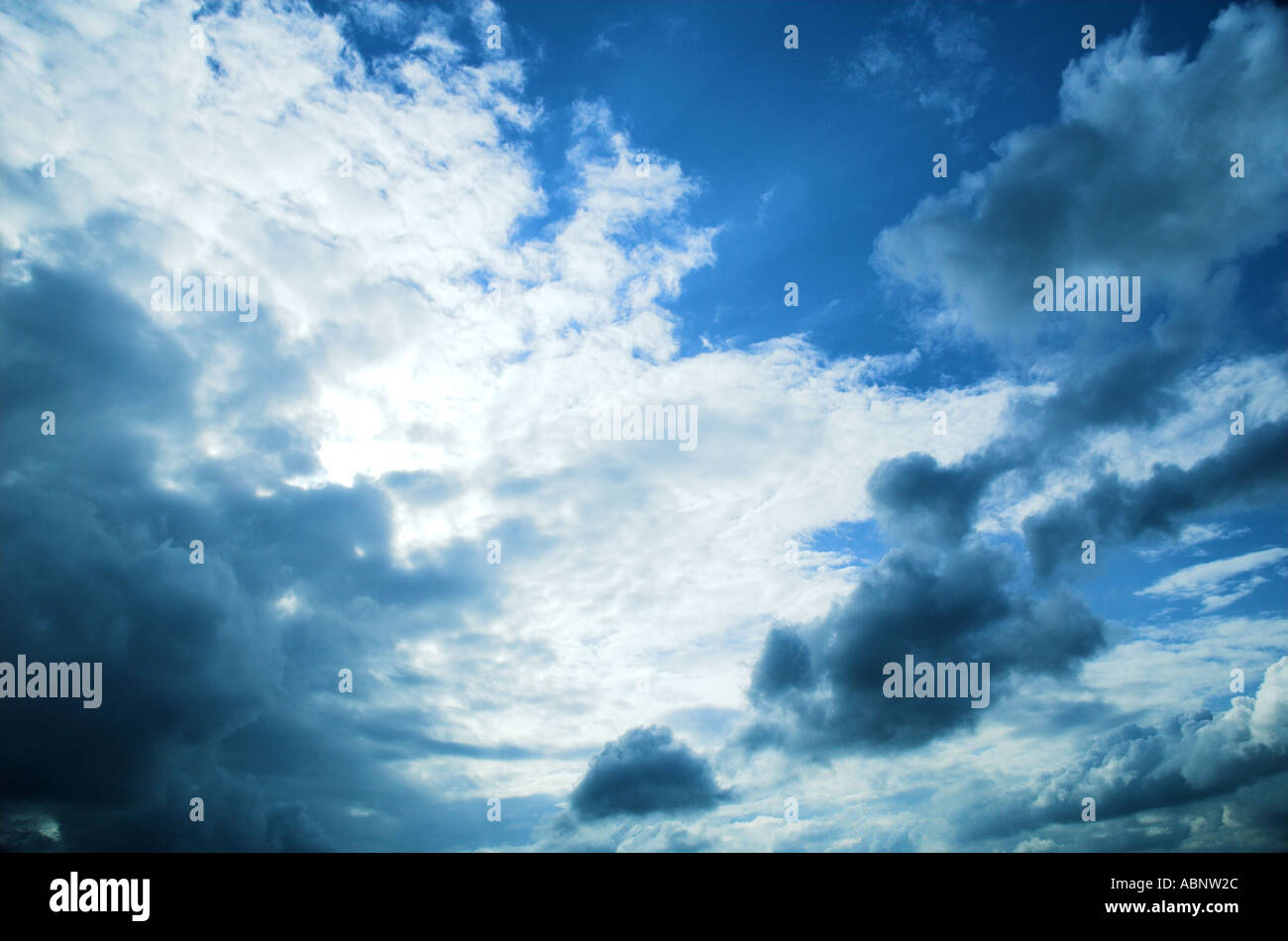Blue sky with clouds, high contrast scene Stock Photo - Alamy