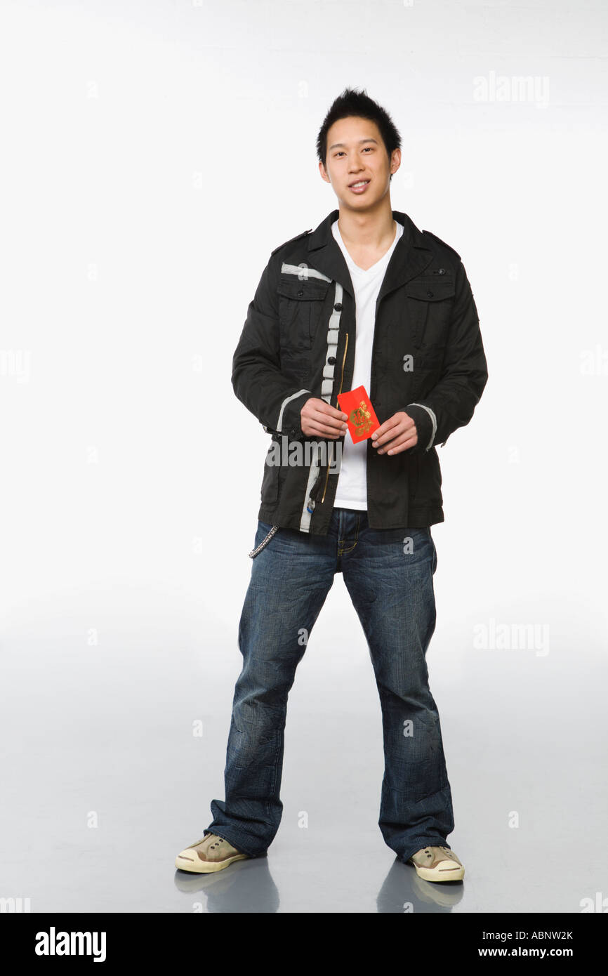 Man holding red card Stock Photo - Alamy