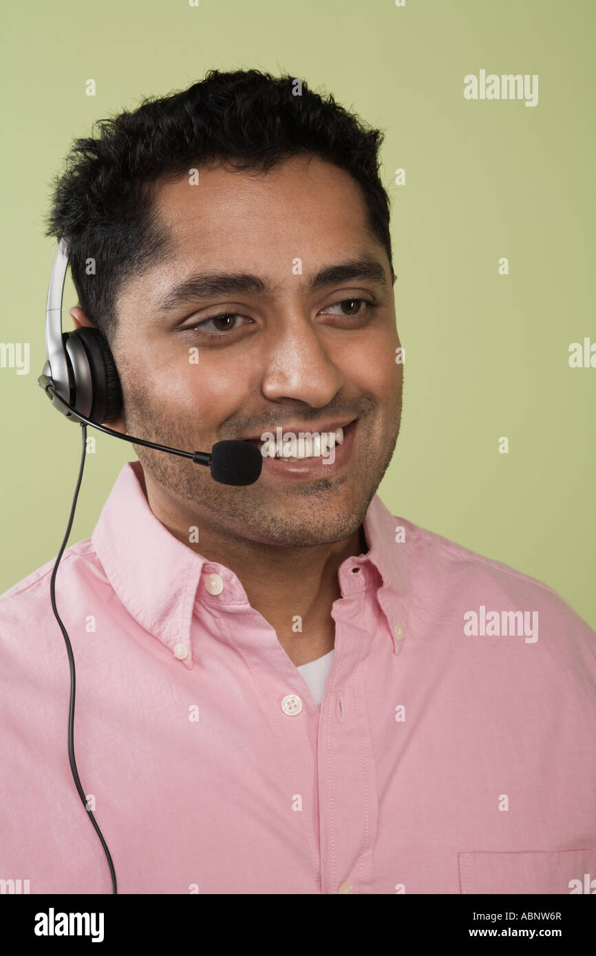 Man wearing a headset Stock Photo - Alamy